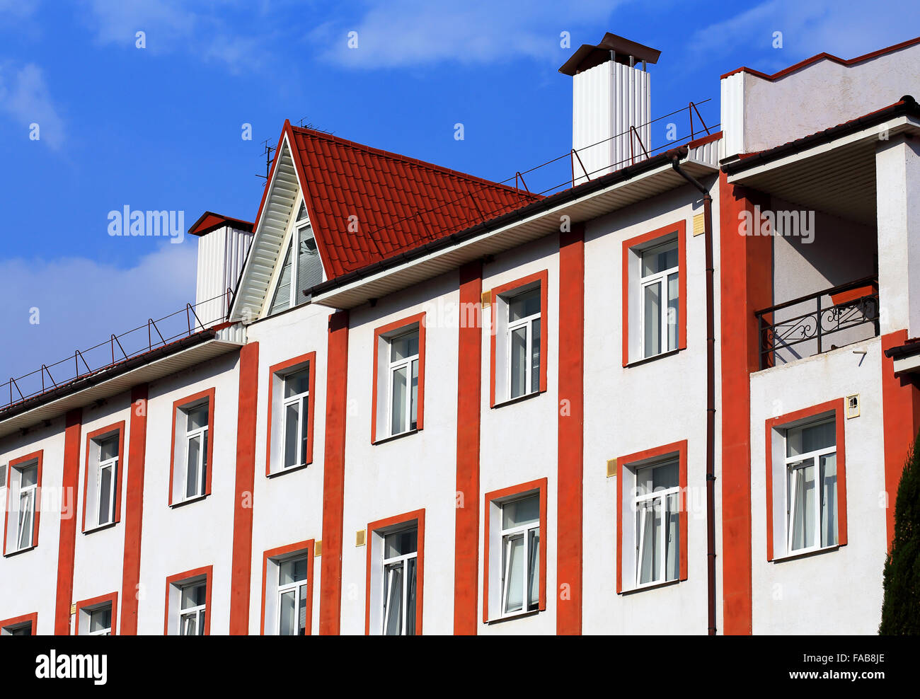 Wall of the modern building with a loft and chimney Stock Photo - Alamy