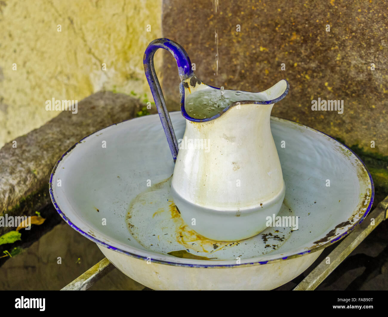 Rustic water pitcher and fountain town of Kaltern in Northern Italy ...