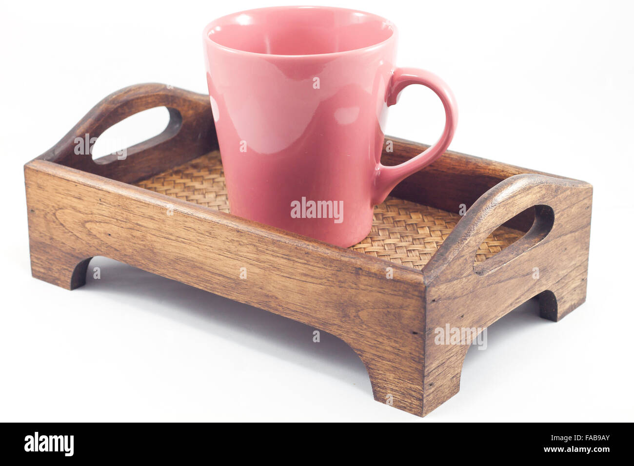Brown mug on wooden tray isolated on white background, stock photo ...