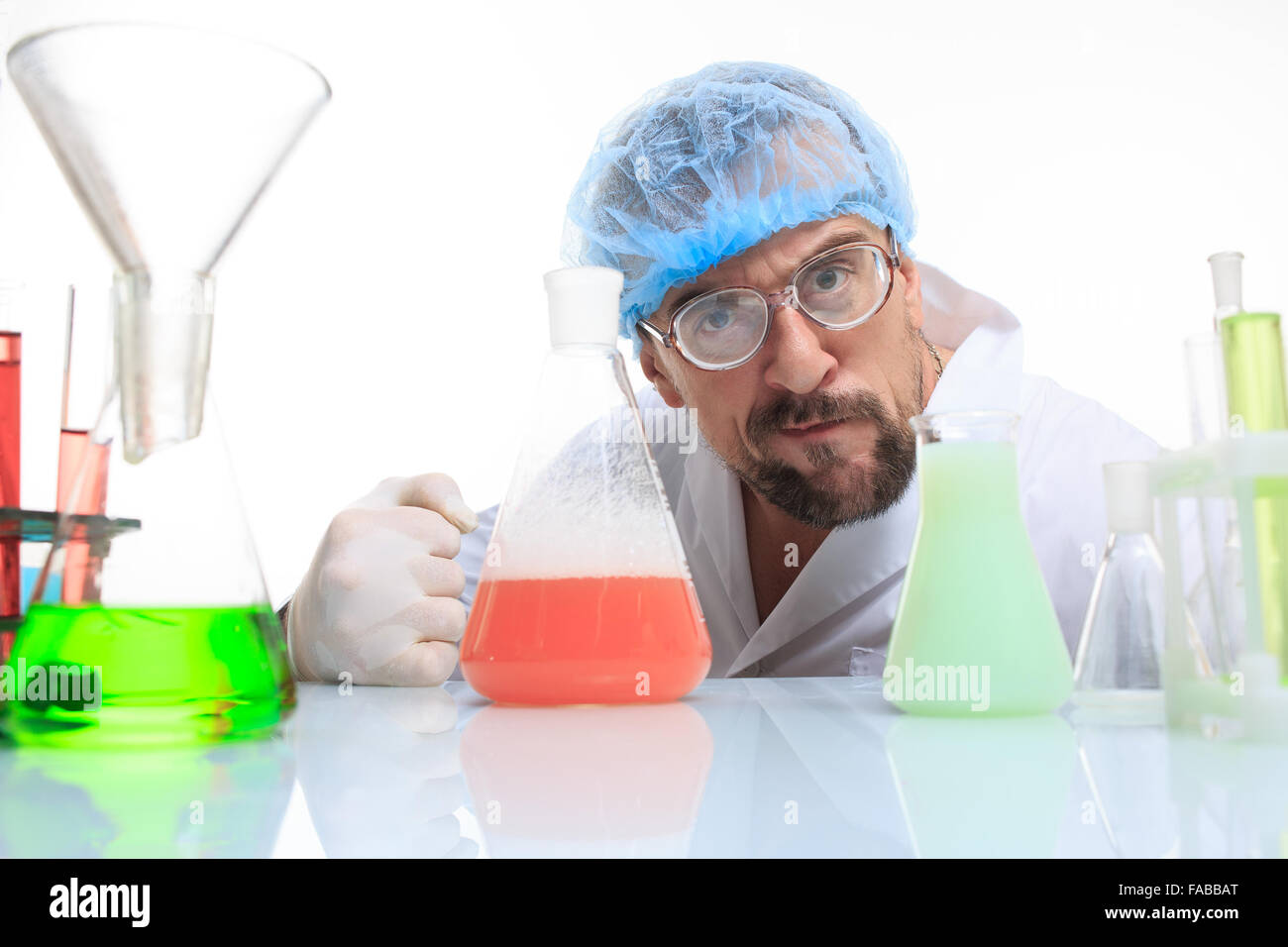 Mad chemist in the lab doing reaction Stock Photo - Alamy