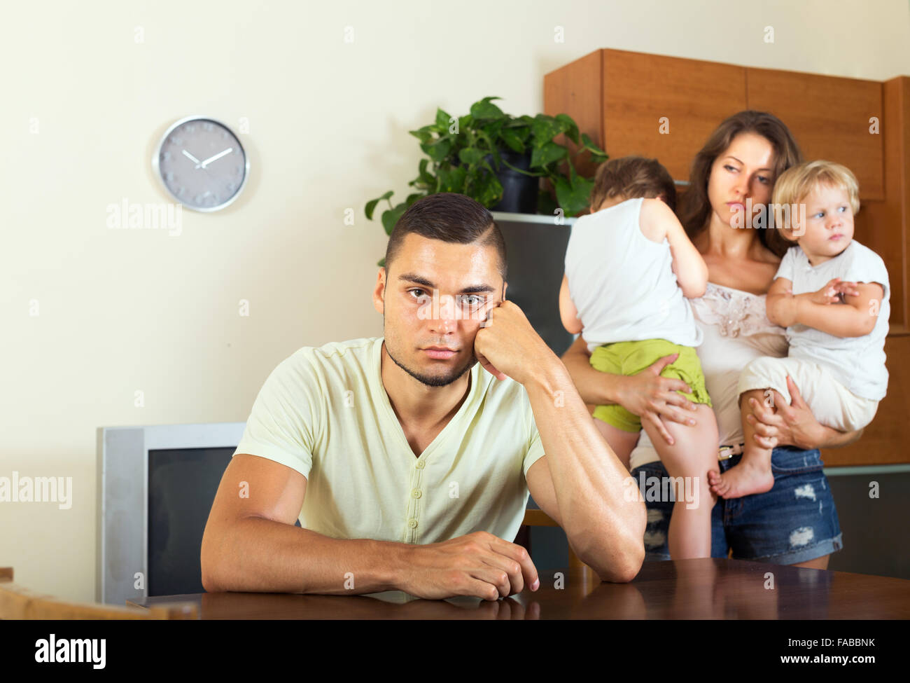 problems of young family with two children Stock Photo - Alamy