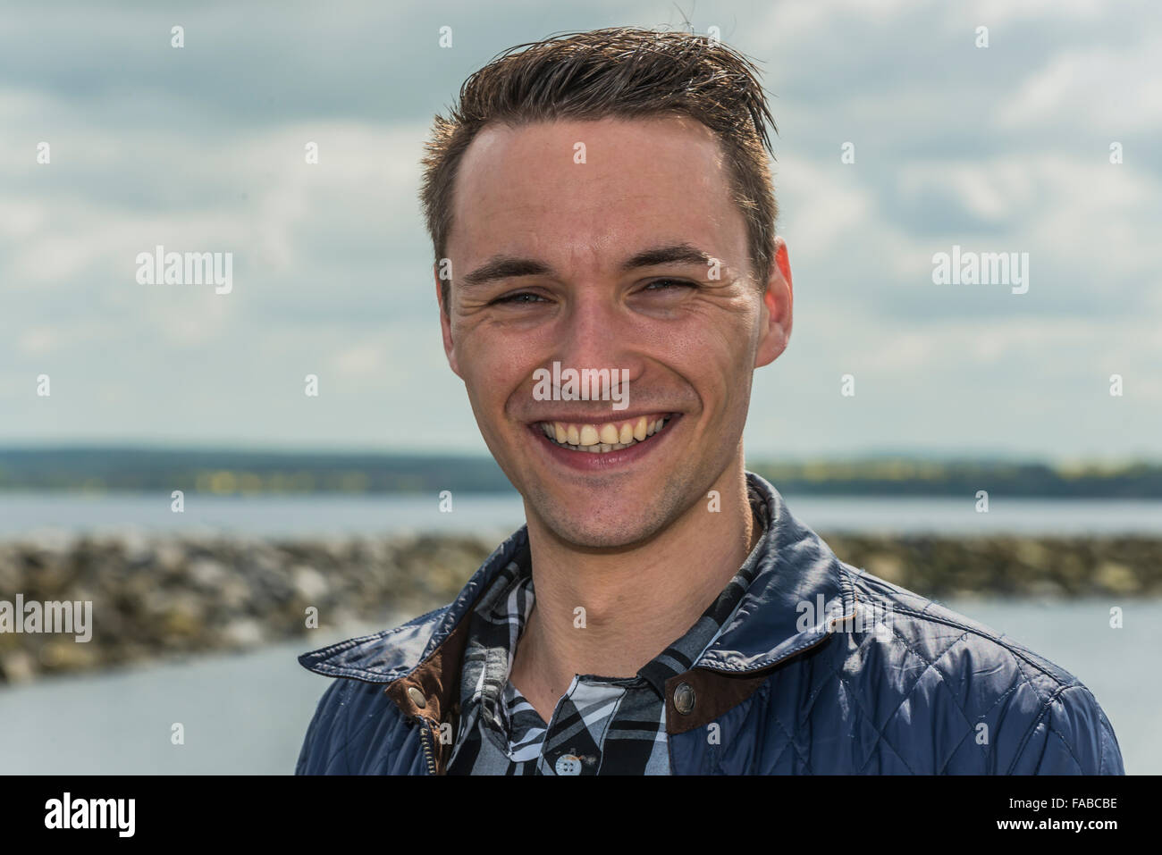 Young man at the Baltic sea Stock Photo - Alamy