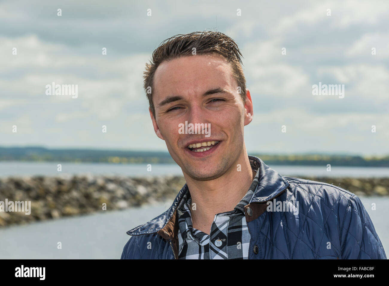 Young man at the Baltic sea Stock Photo - Alamy
