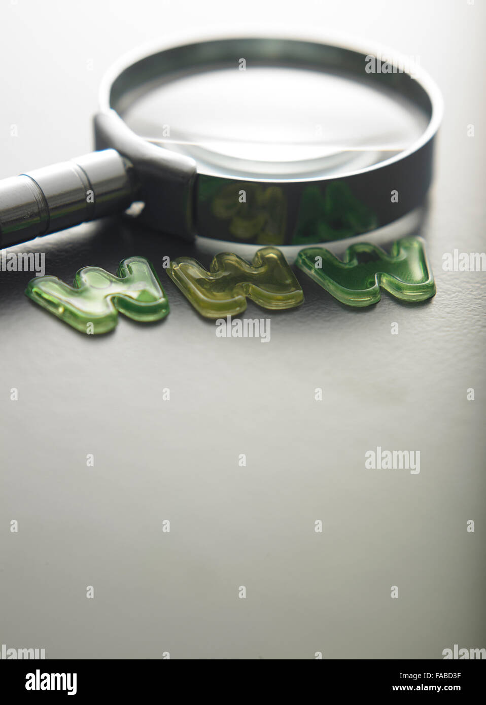 Magnify glass letters hi-res stock photography and images - Alamy
