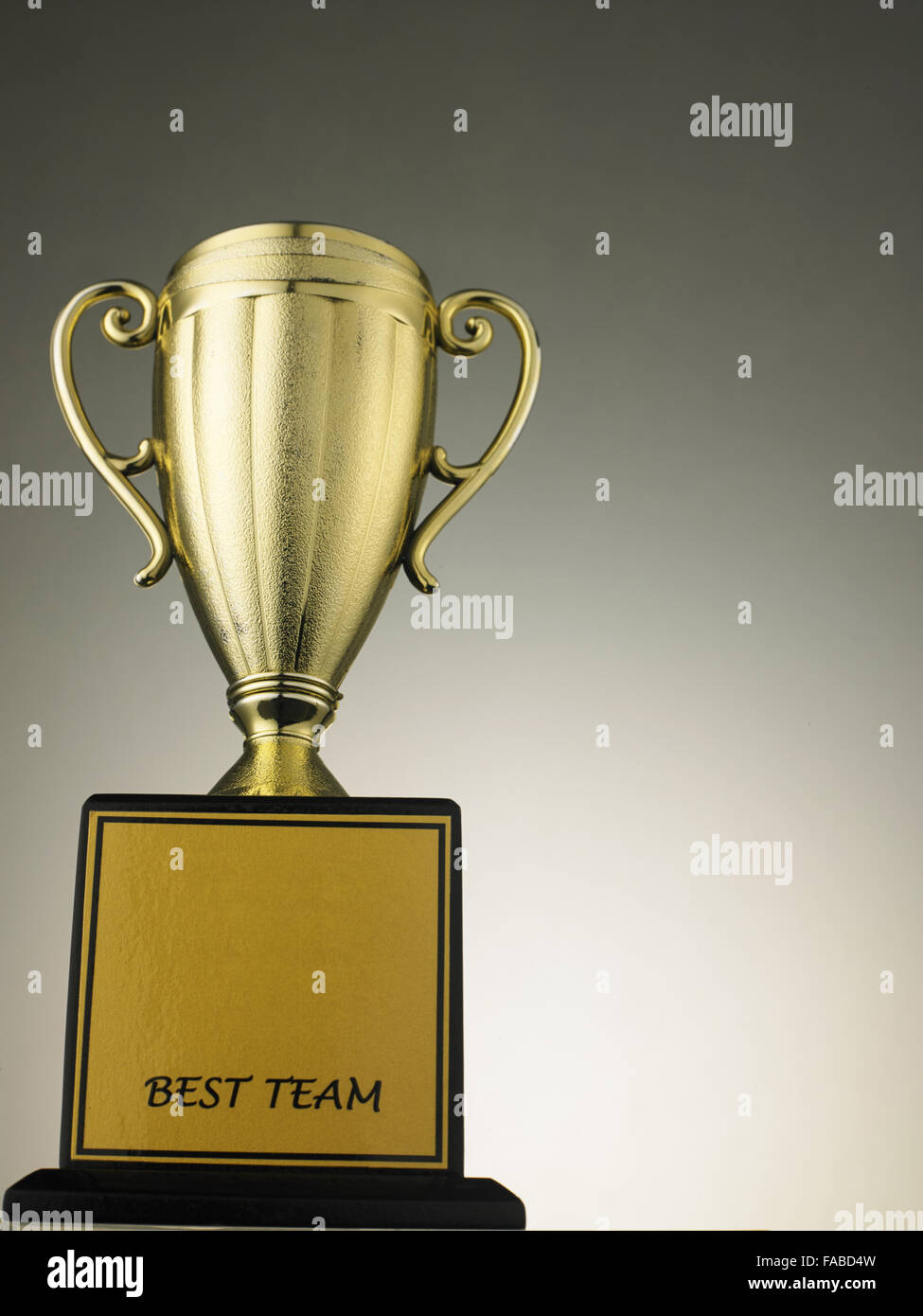 gold trophy for the beast teamwork Stock Photo - Alamy