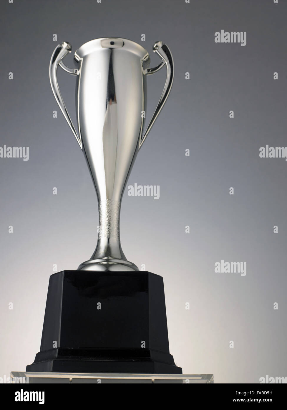 low angle of tall silver trophy Stock Photo - Alamy