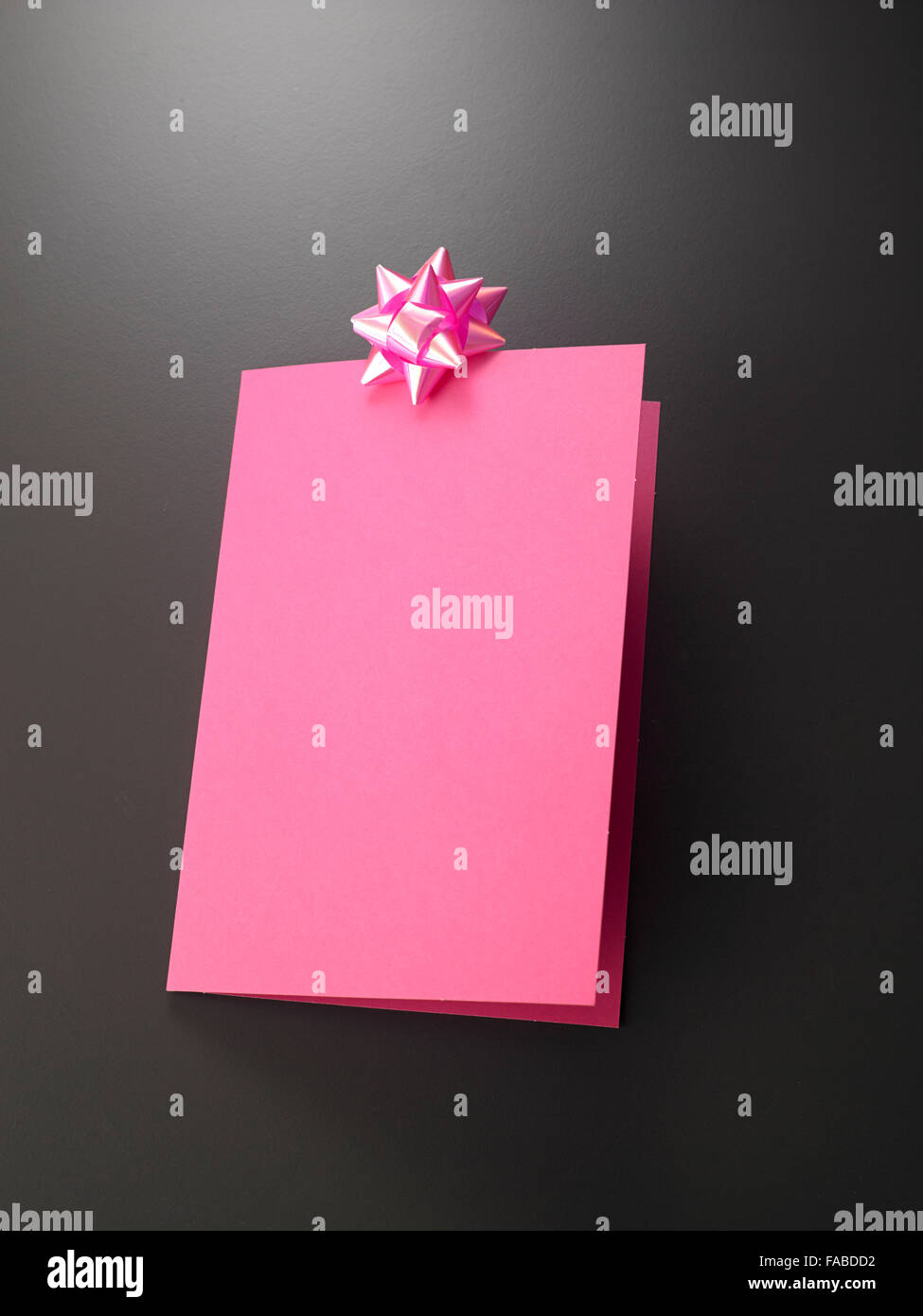 pink greeting card with ribbon Stock Photo - Alamy