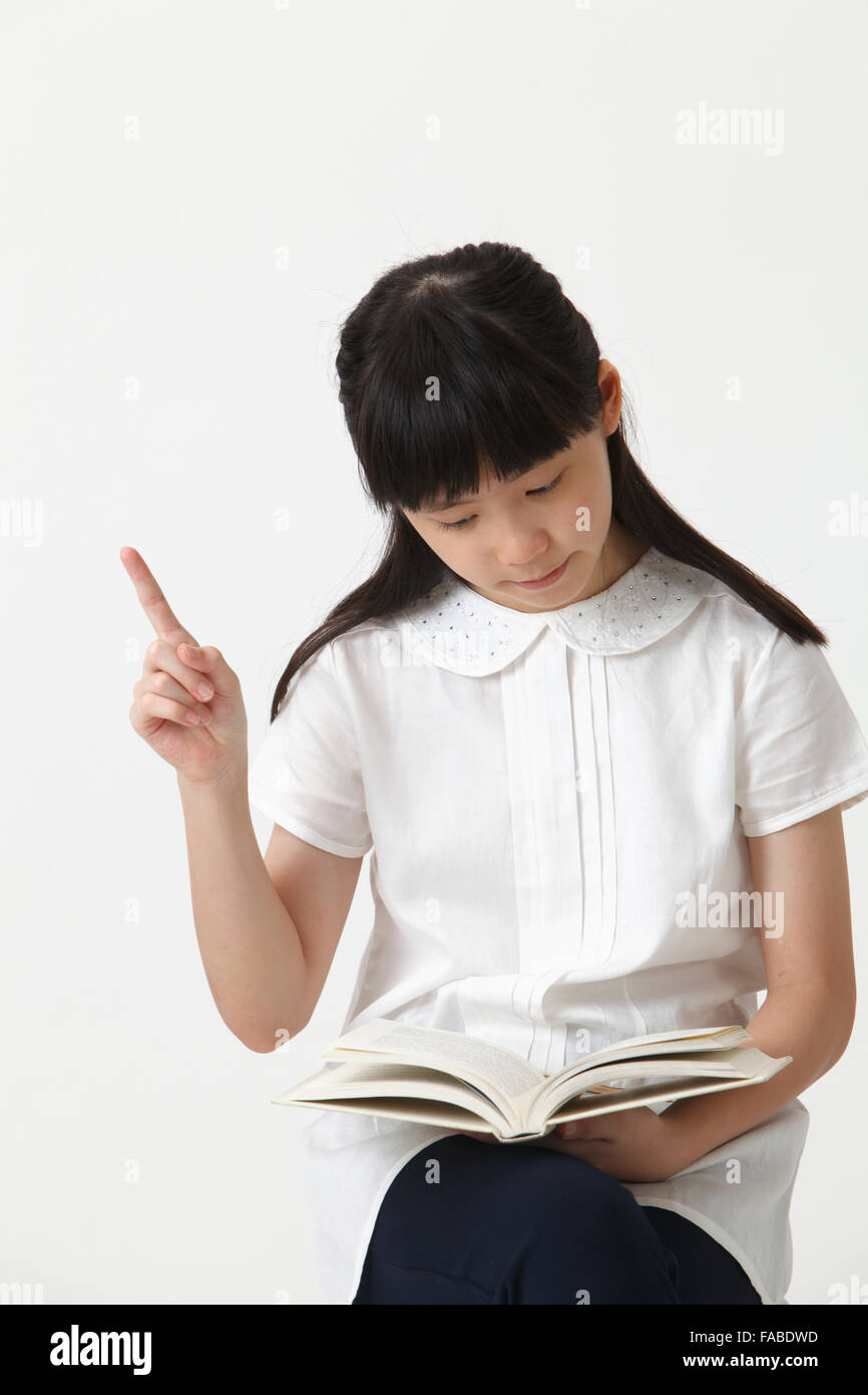 chinese girl enjoy reading book Stock Photo - Alamy