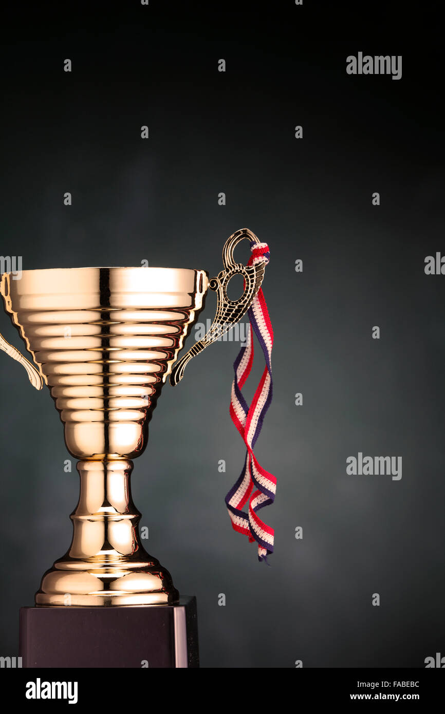 Golden trophy cup ribbon hi-res stock photography and images - Alamy