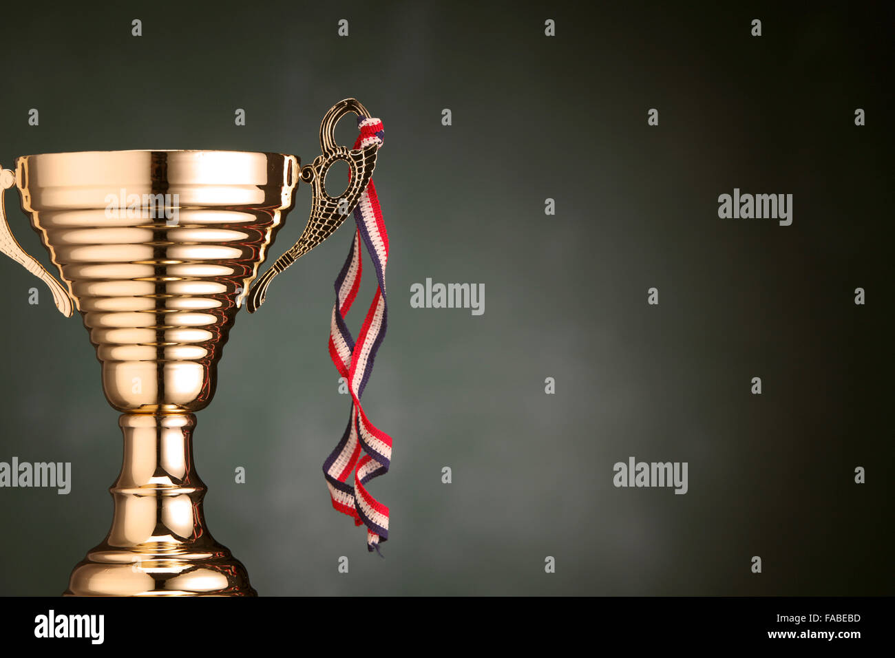 Golden trophy cup ribbon hi-res stock photography and images - Alamy