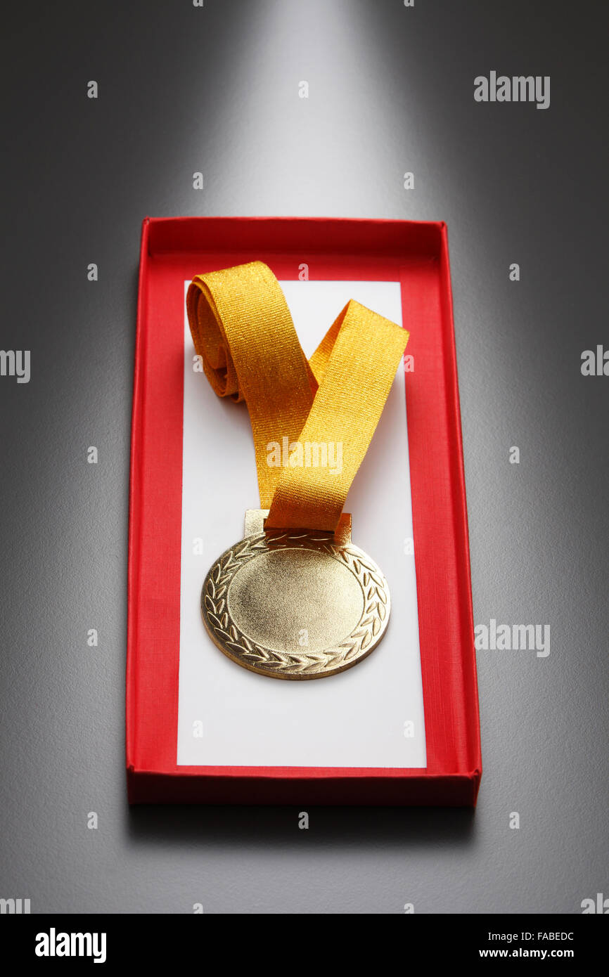 gold color medal in a box Stock Photo - Alamy