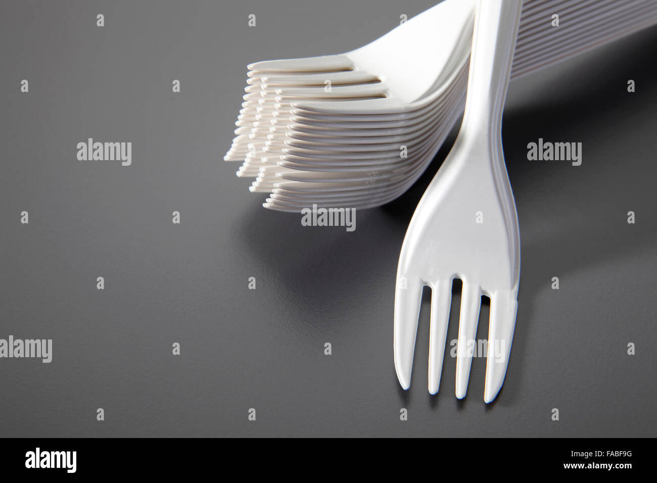 stack of the plastic fork Stock Photo - Alamy
