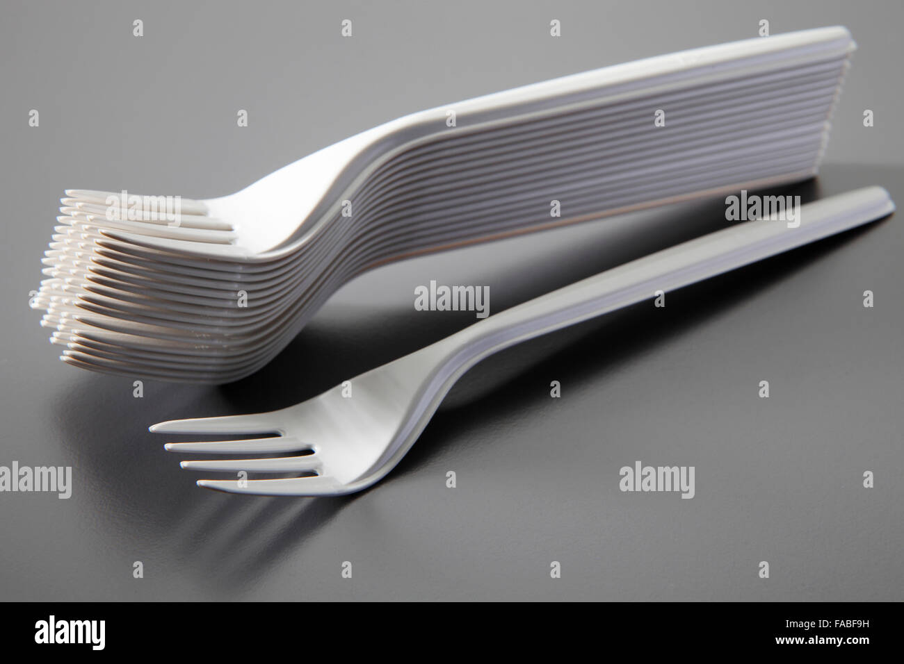 stack of the plastic fork Stock Photo - Alamy