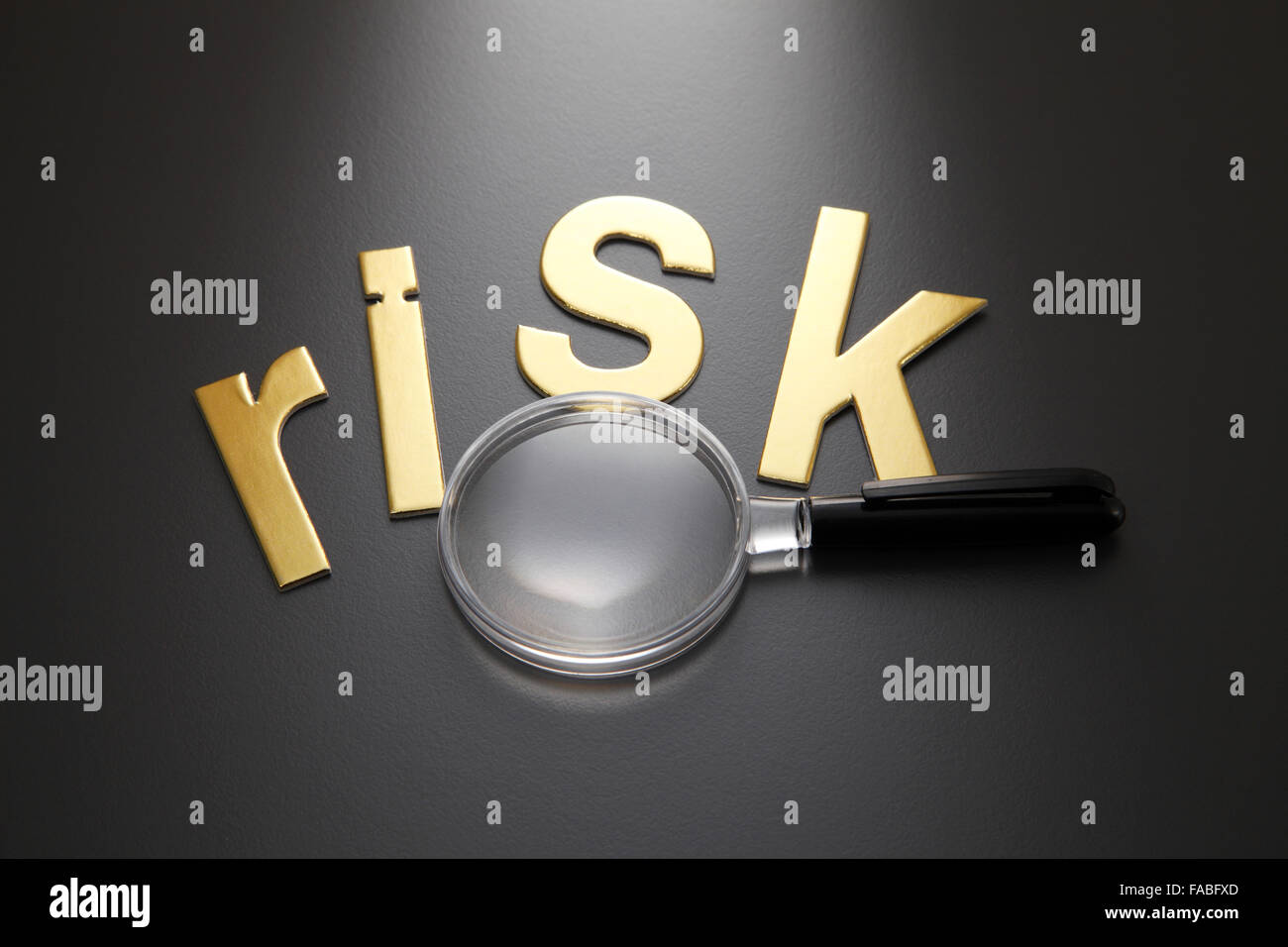word risk and magnifier glass Stock Photo - Alamy