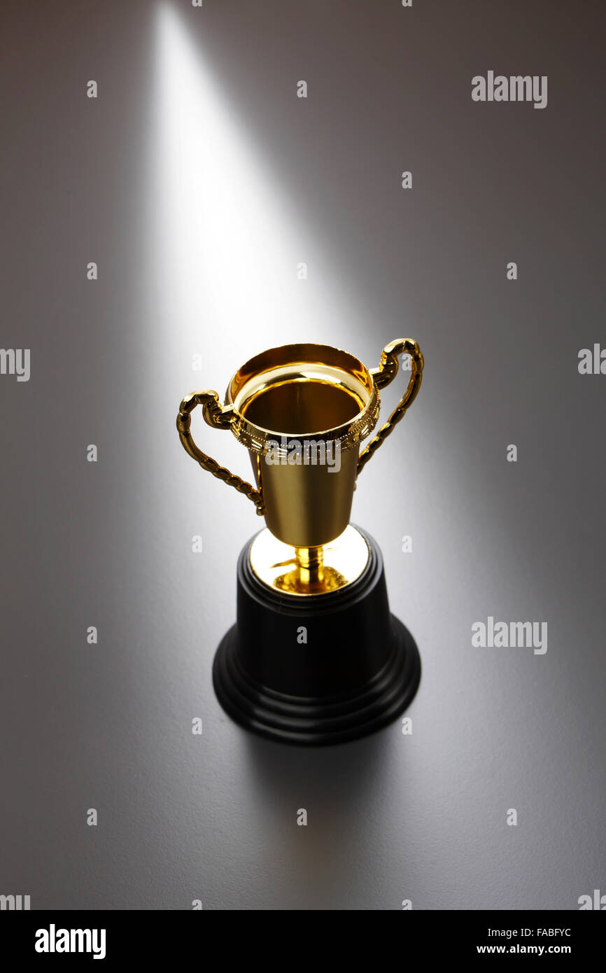 golden trophy on the gray background Stock Photo - Alamy