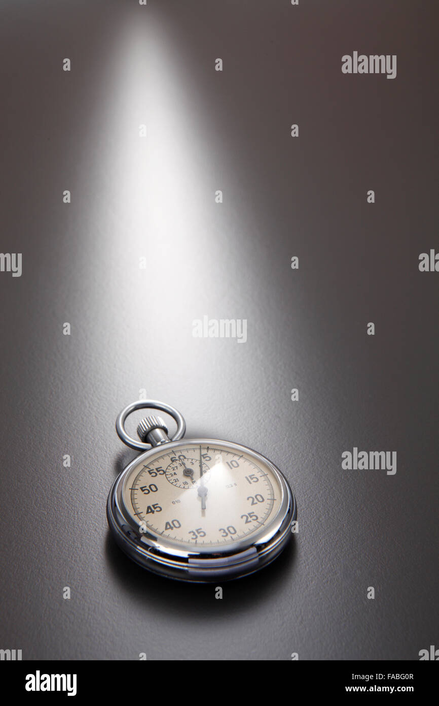 stopwatch and the ray background Stock Photo - Alamy