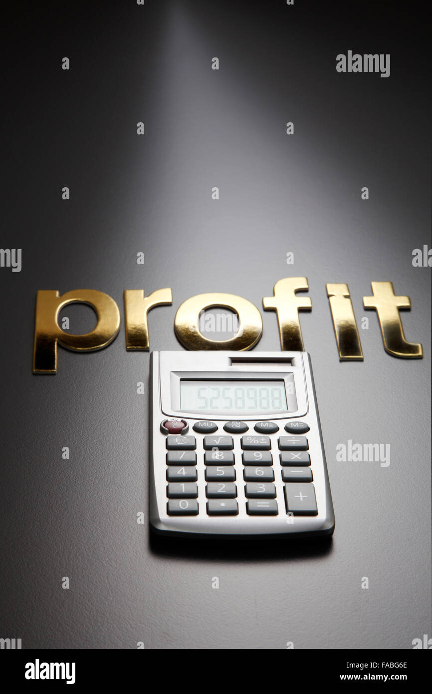 word profit and the calculaator Stock Photo - Alamy