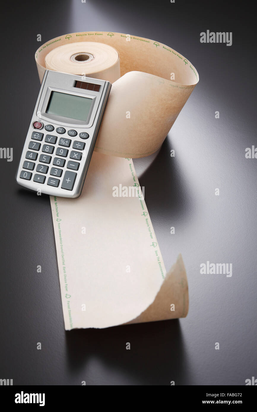 calculator and adding machine tape Stock Photo - Alamy