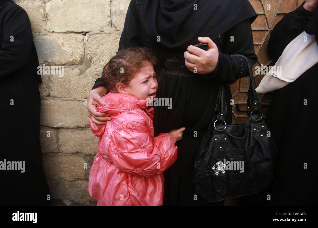 Gaza City, Gaza Strip, Palestinian Territory. 26th Dec, 2015. Relatives ...