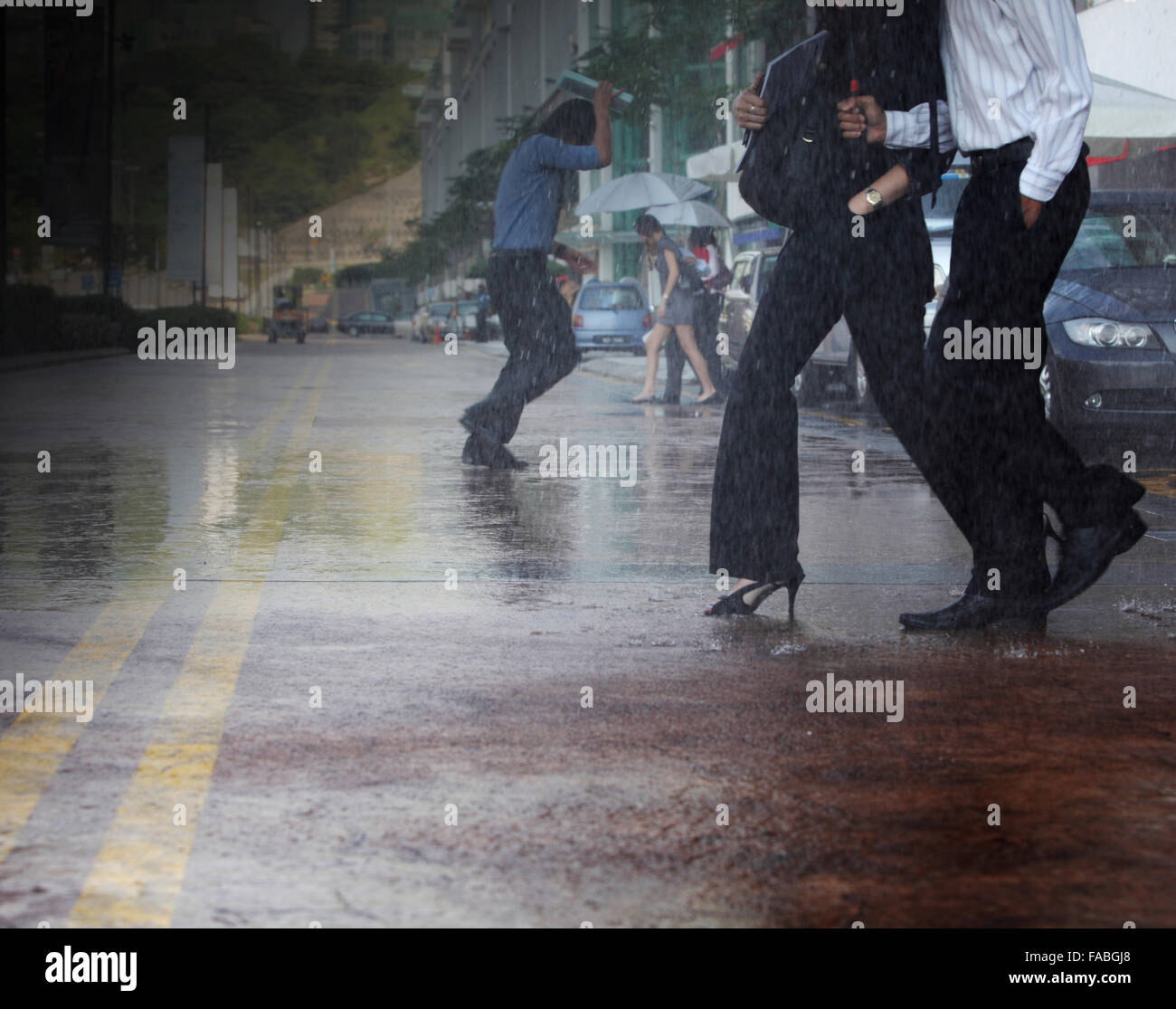 office people rushing in the rain Stock Photo - Alamy