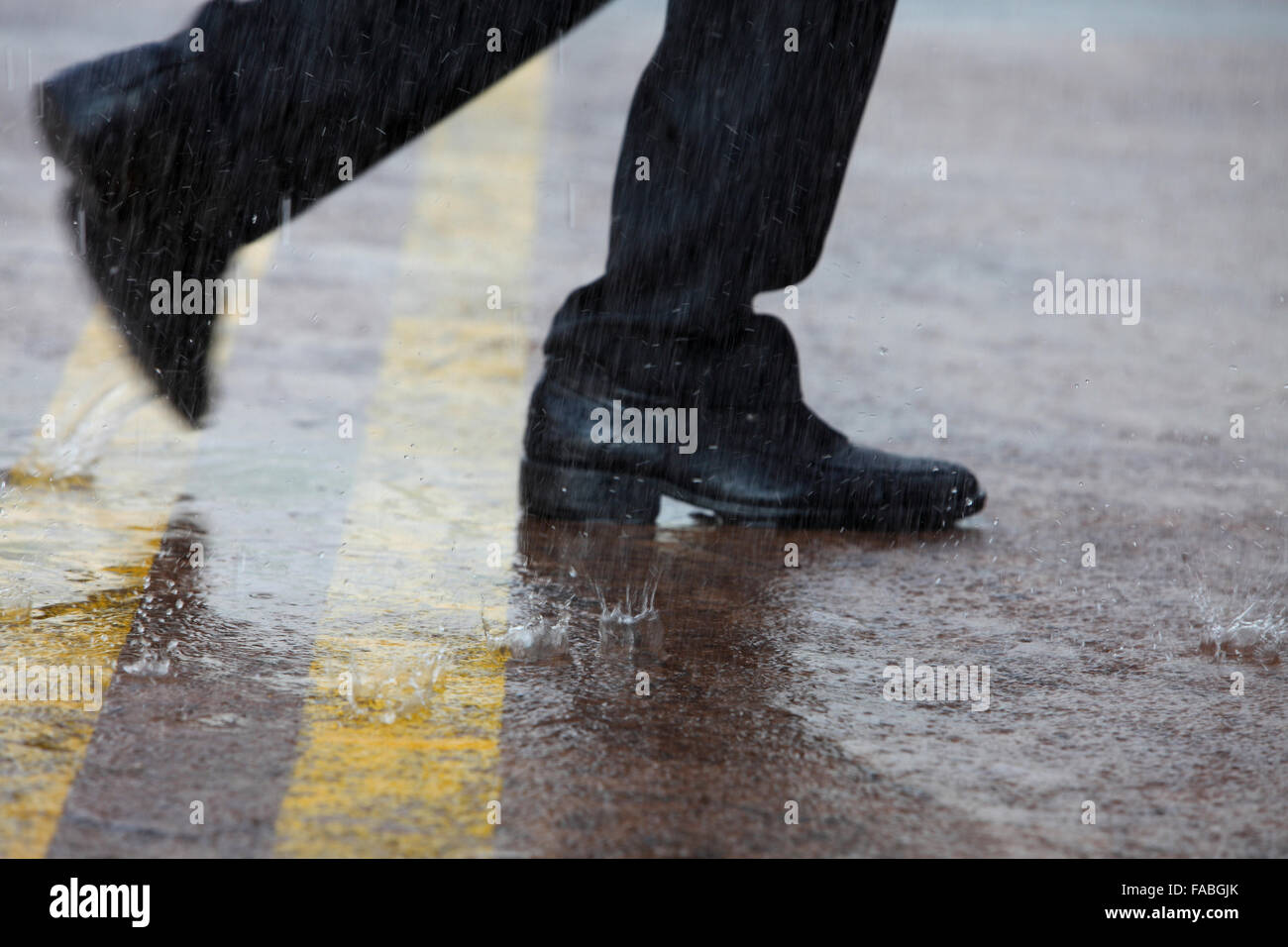 Businessman running rain hi-res stock photography and images - Alamy