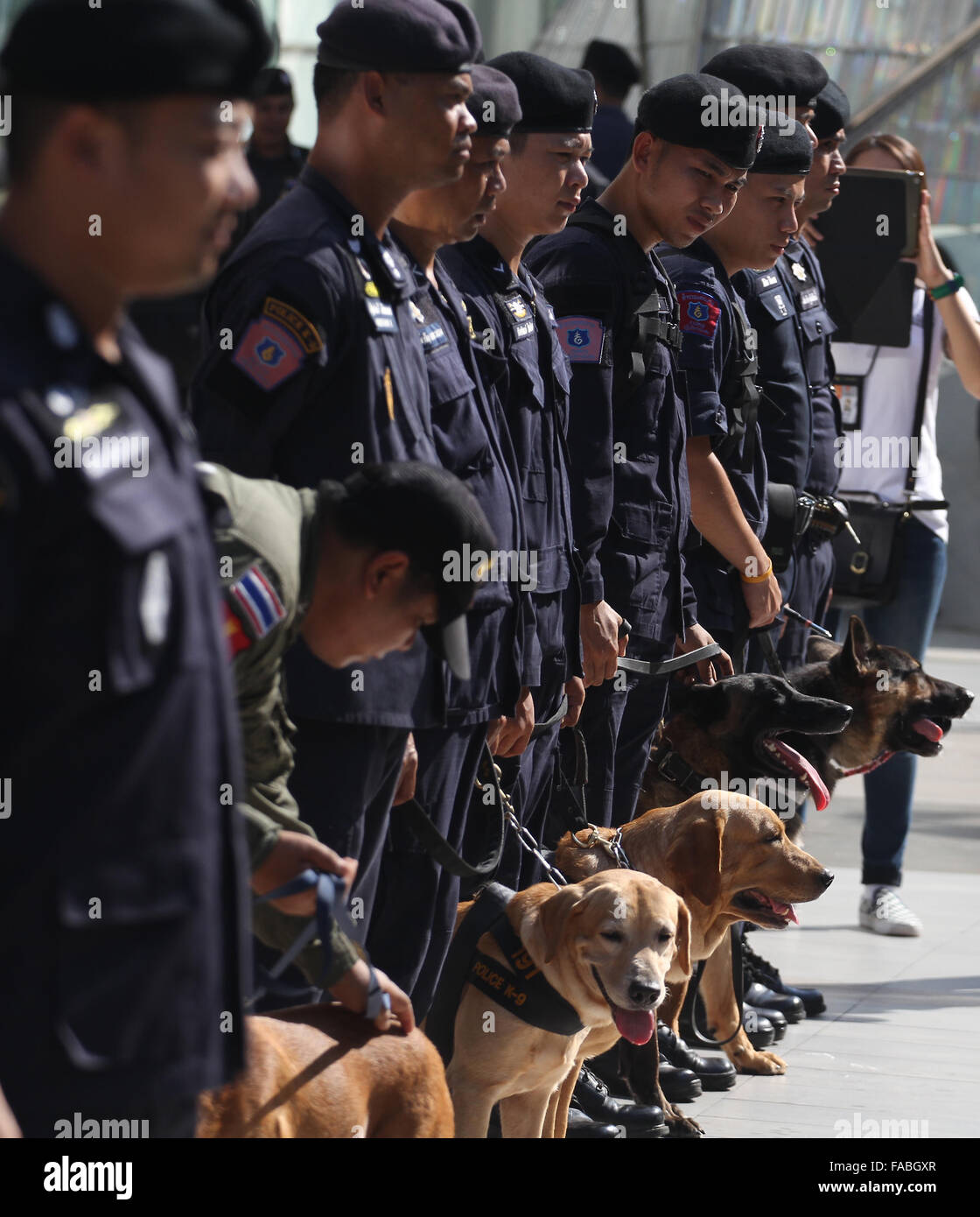 Bangkok, Thailand. 26th Dec, 2015. A Thai K9 unit and EOD unit stands ...
