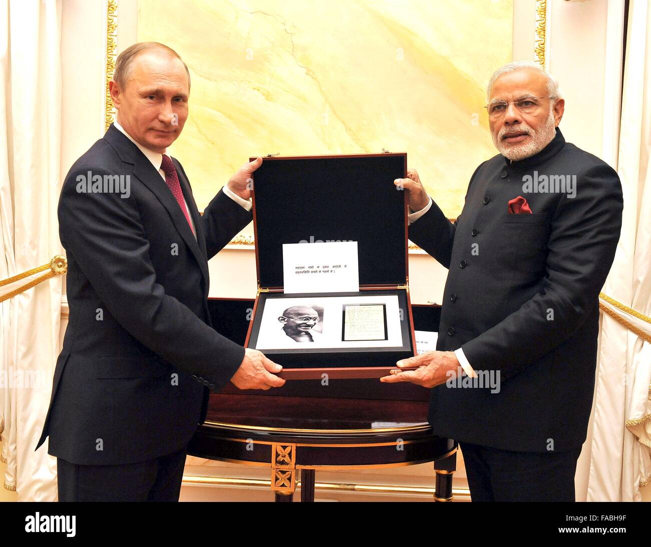 Indian Prime Minister Narendra Modi presents Russian President Vladimir ...