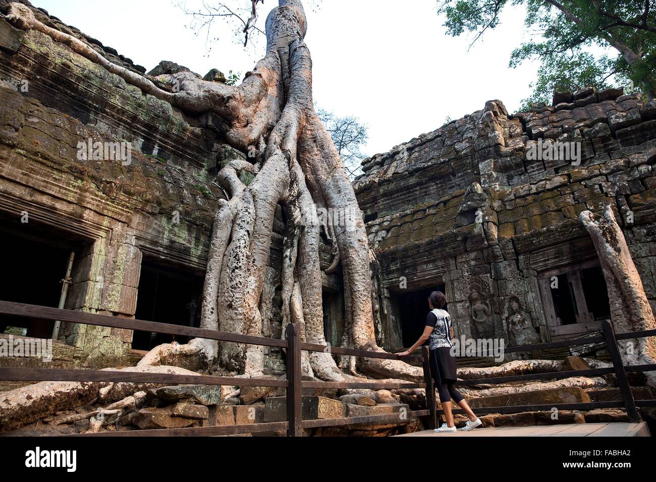 U.S. First Lady Michelle Obama views the Ta Phrom temple during a tour ...
