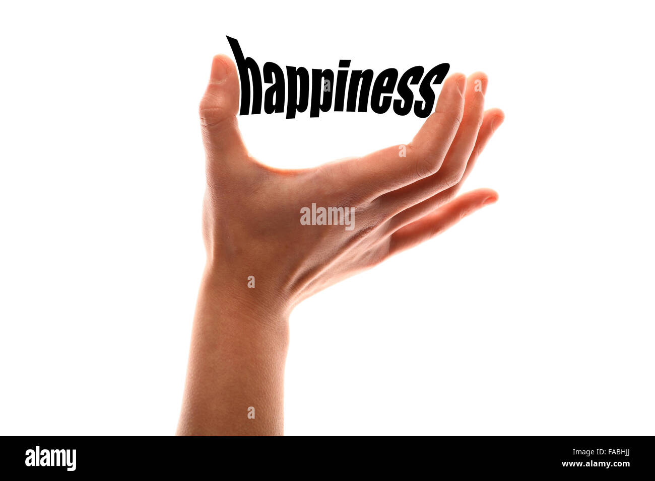 Color horizontal shot of a of a hand squeezing the word "happiness ...