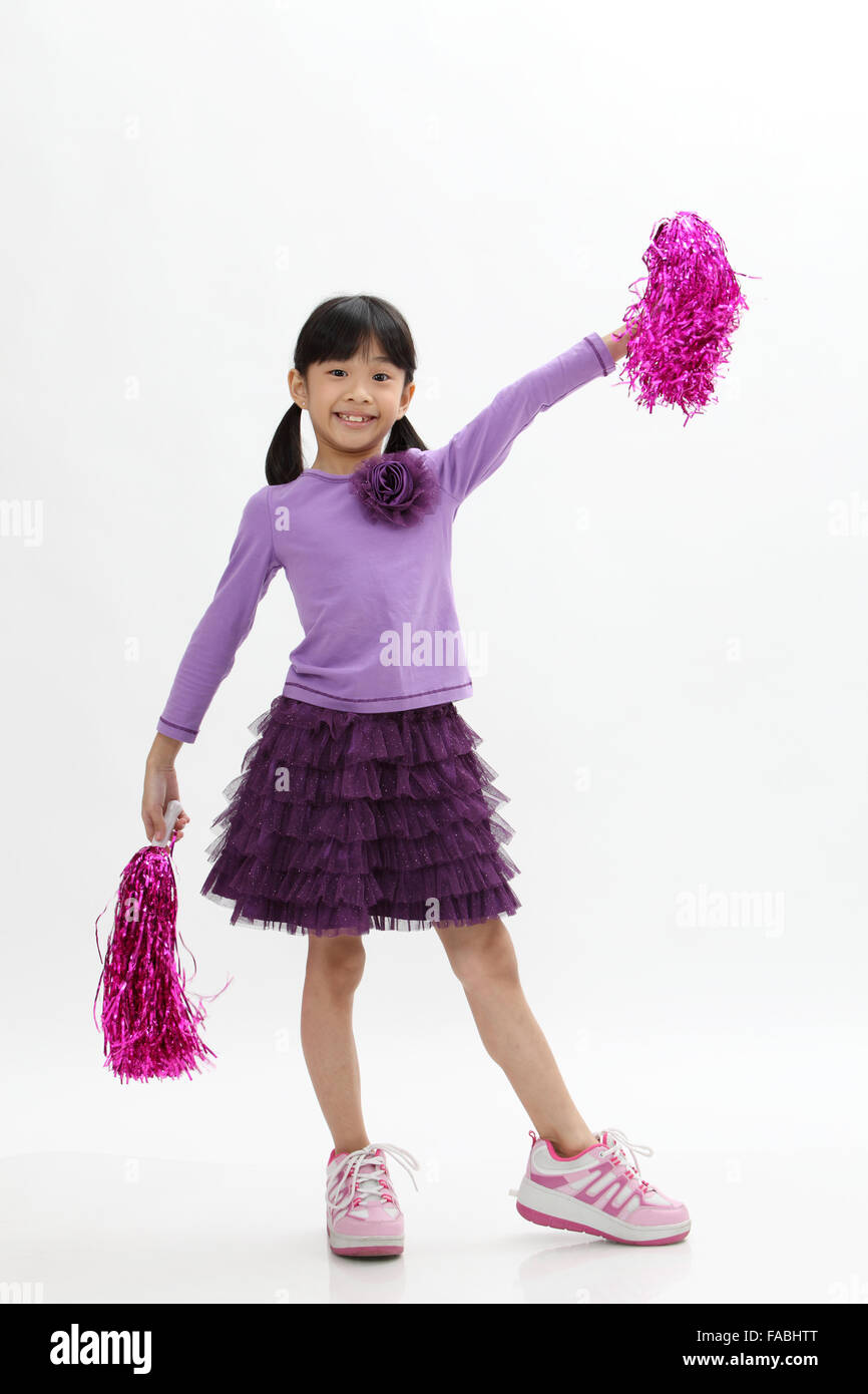 chinese girl holding pom pom Stock Photo - Alamy