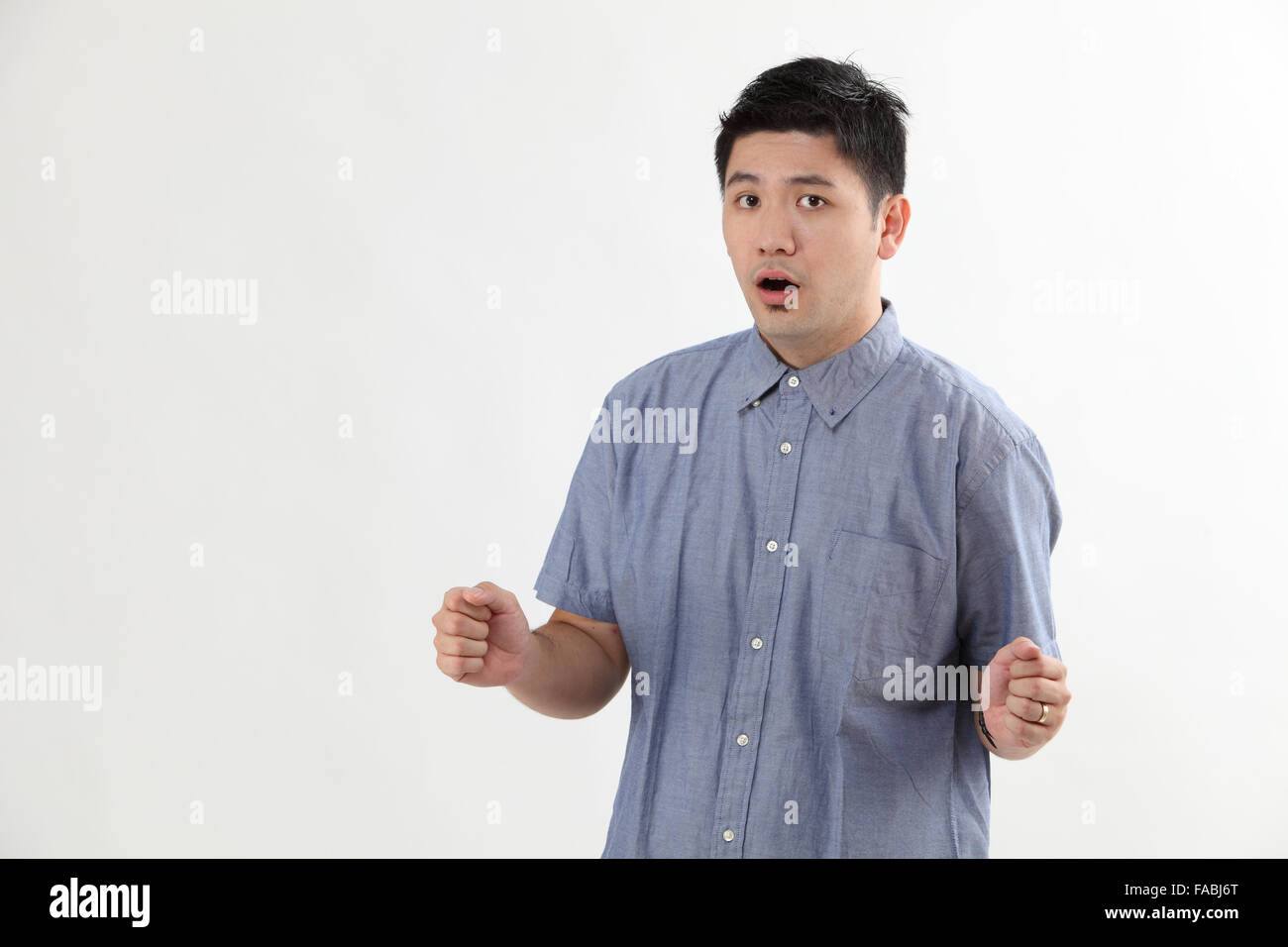 Surprised chinese man looking camera hi-res stock photography and ...