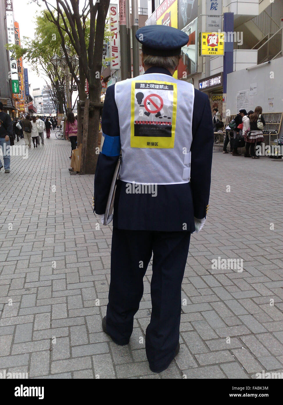 Japanese no smoking area enforcement officer, Tokyo, Japan Stock Photo ...