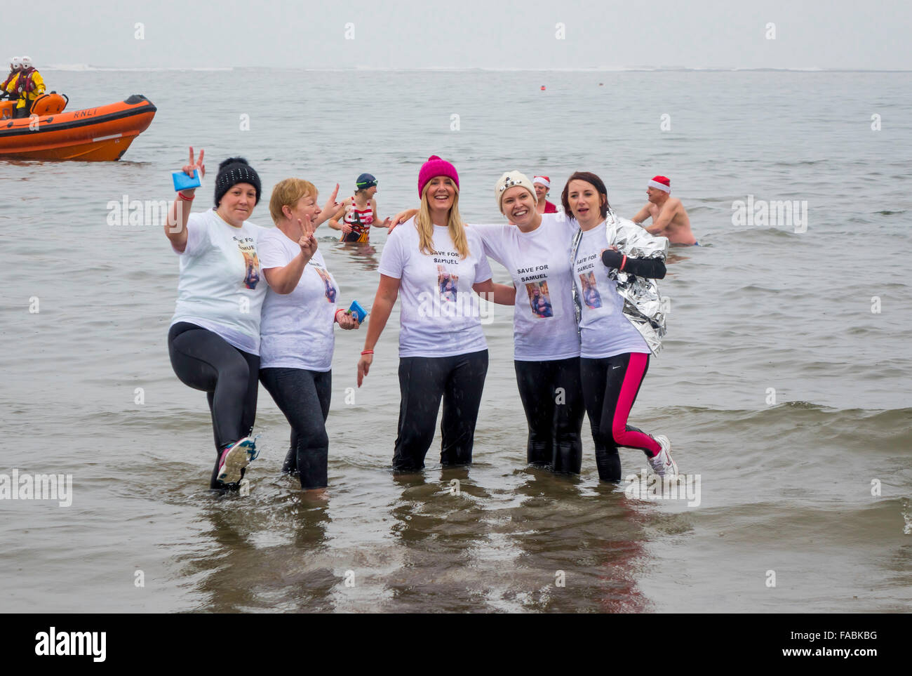 Redcar, UK. 26th Dec, 2015. Participants from Save For Samuel posing in ...