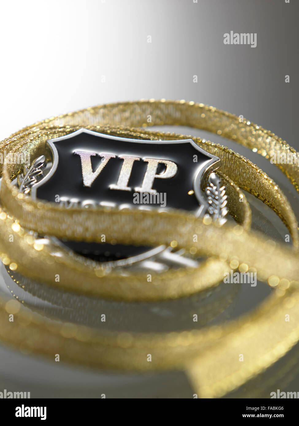vip badge and the golden ribbon Stock Photo - Alamy