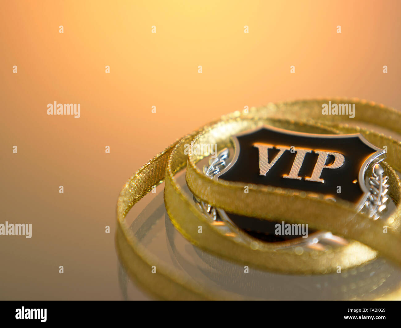 vip badge and the golden ribbon Stock Photo - Alamy