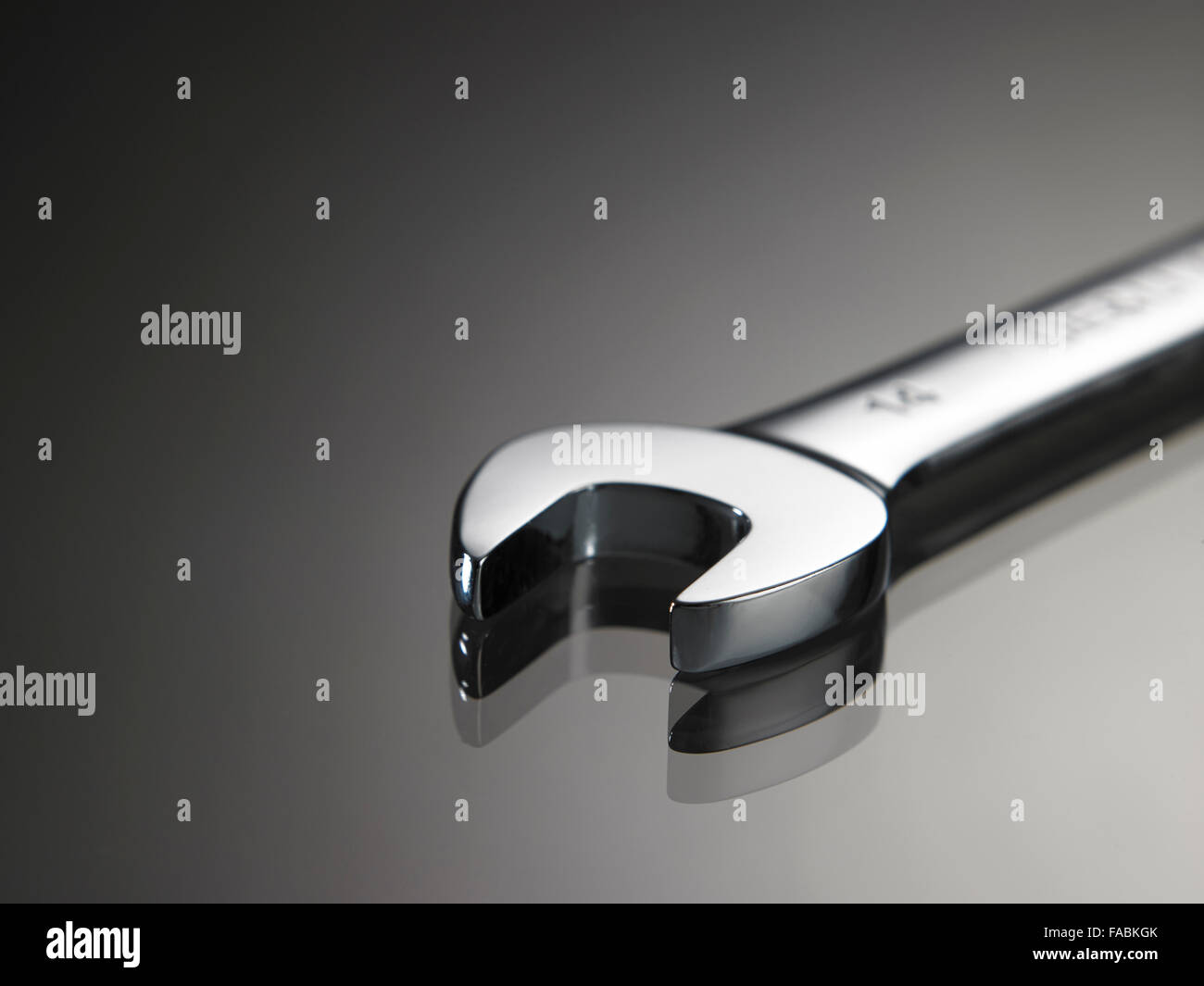 close up of the wrench on the gray background with reflection Stock ...