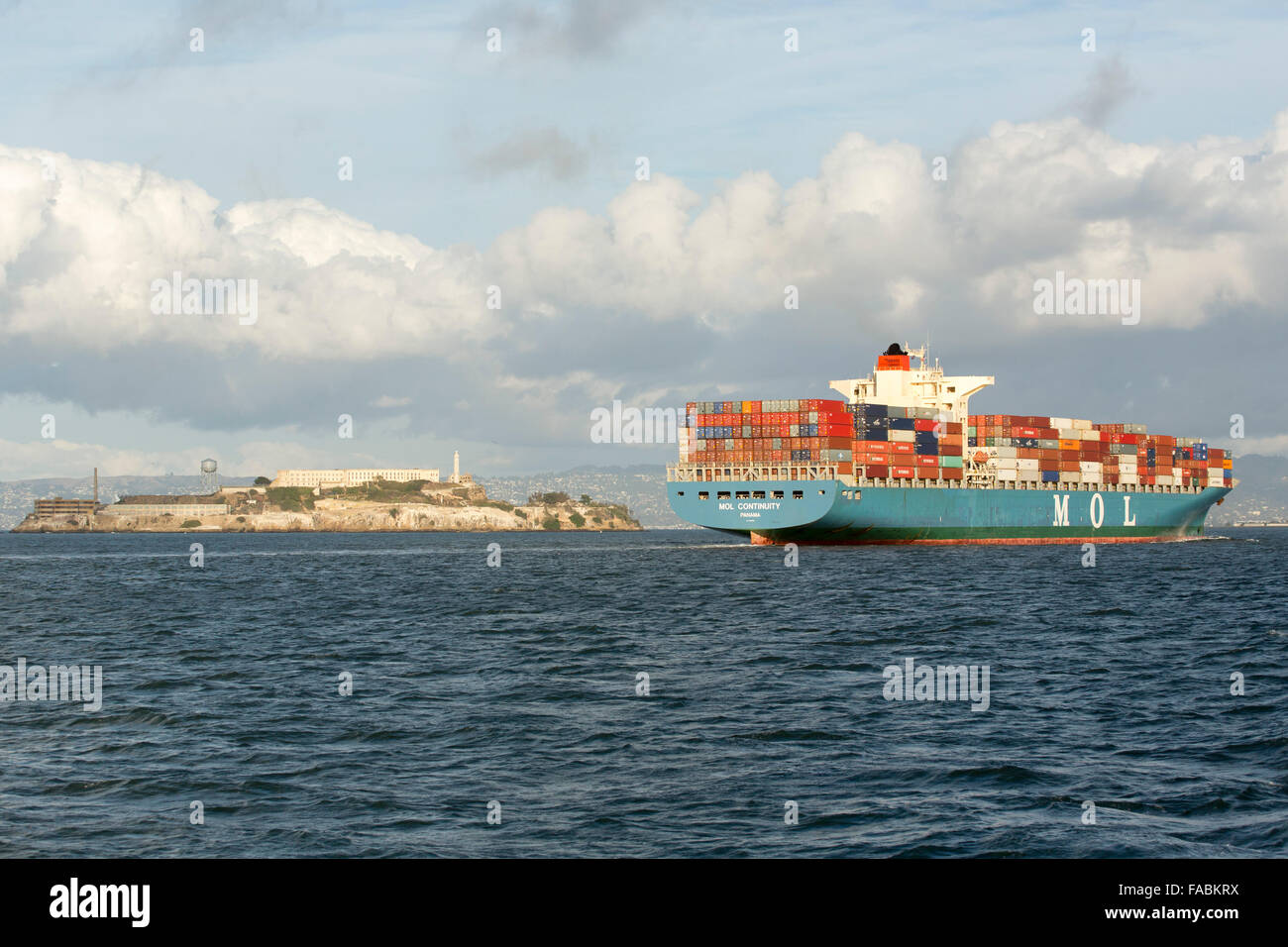 Container ship with Alcatraz Island in the background, San Francisco ...
