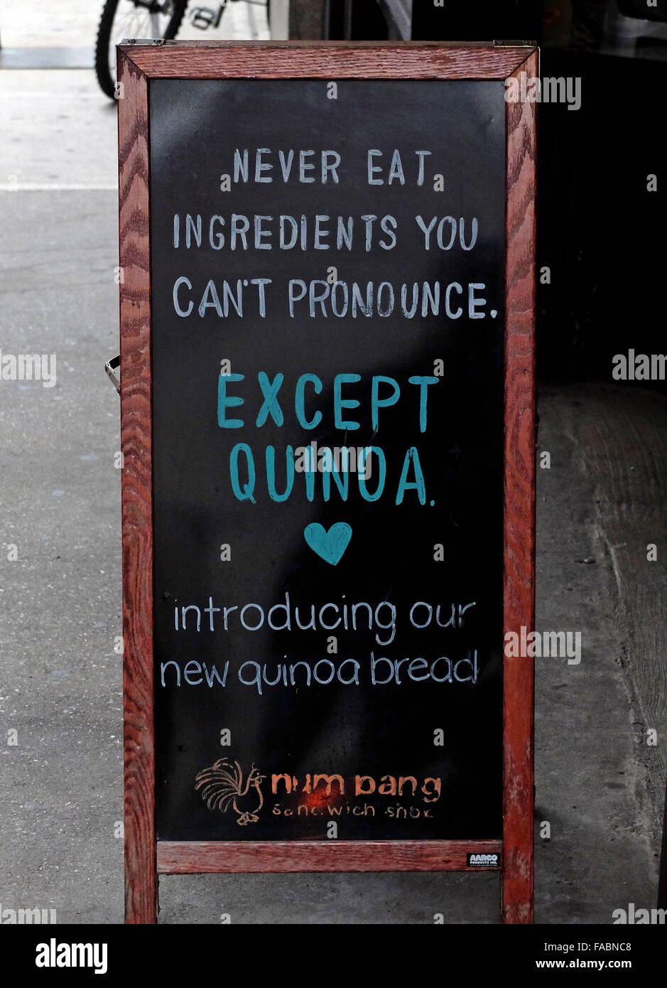 A funny sign about eating Quinoa at, the Num Pang Cambodian restaurant ...