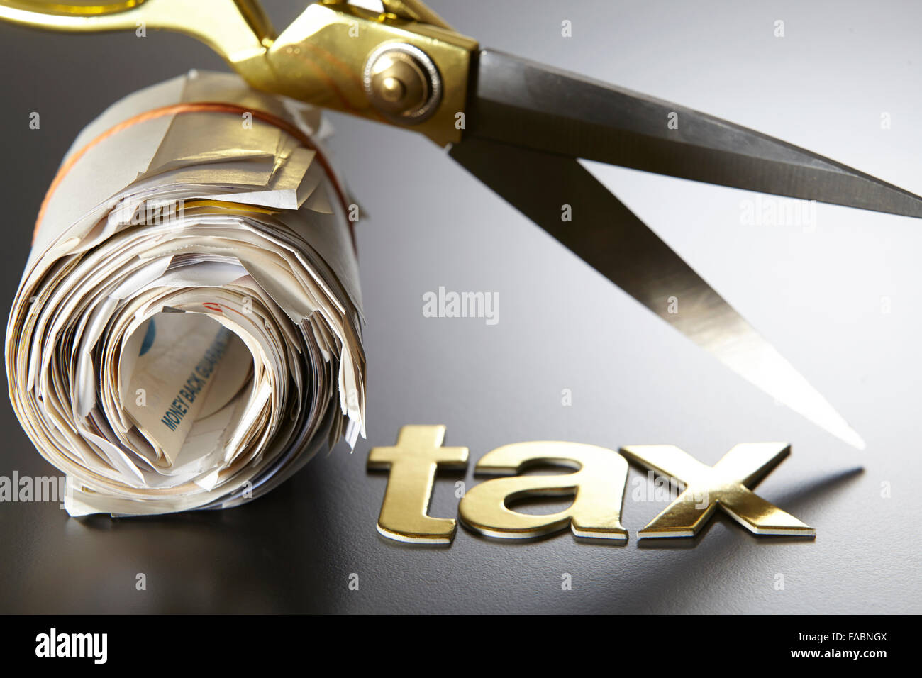 expense receipt ,tax,and scissors Stock Photo - Alamy