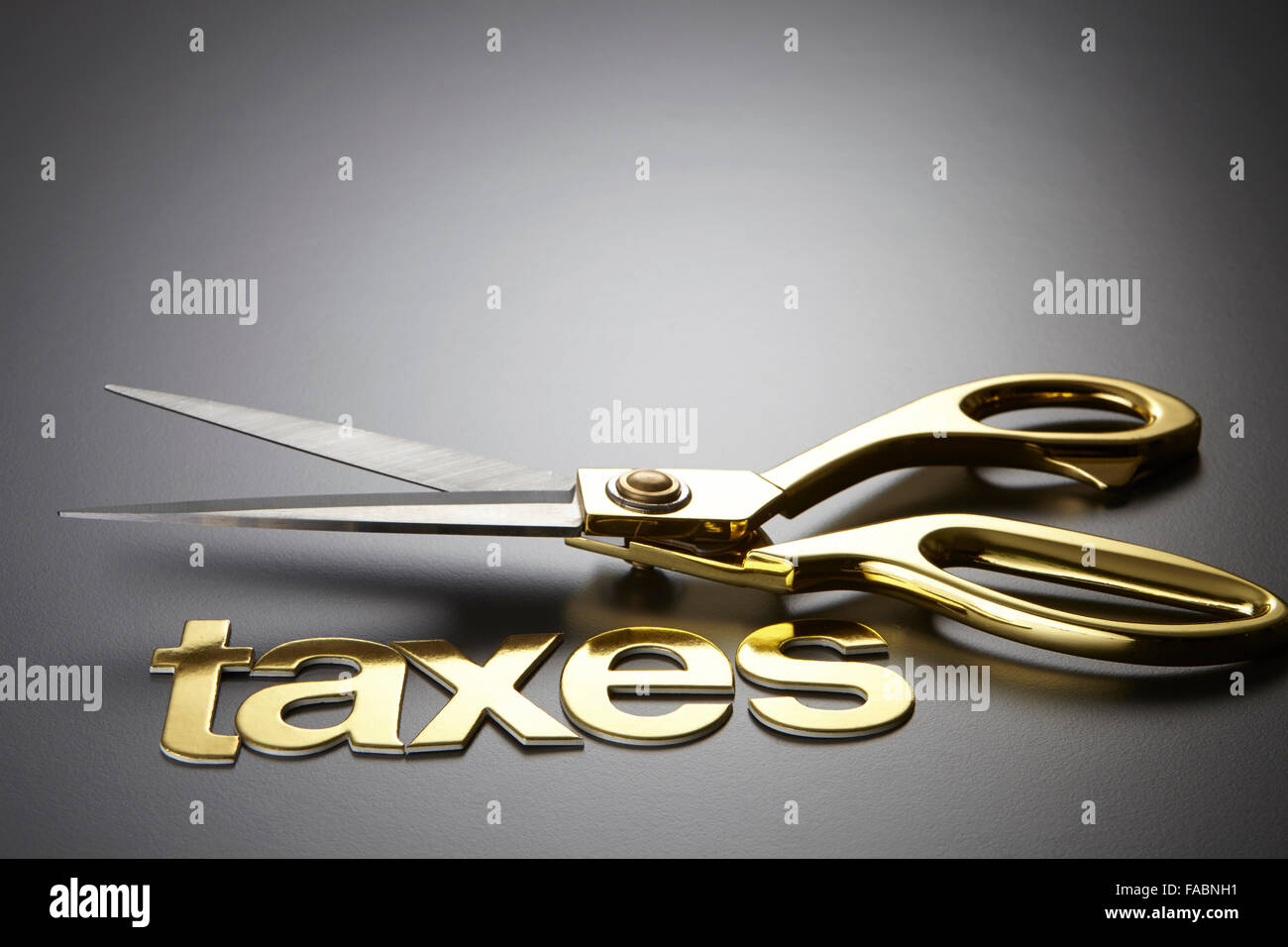 Scissors cut taxes hi-res stock photography and images - Alamy