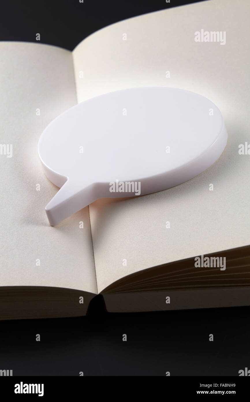 speech bubble on the open page Stock Photo - Alamy