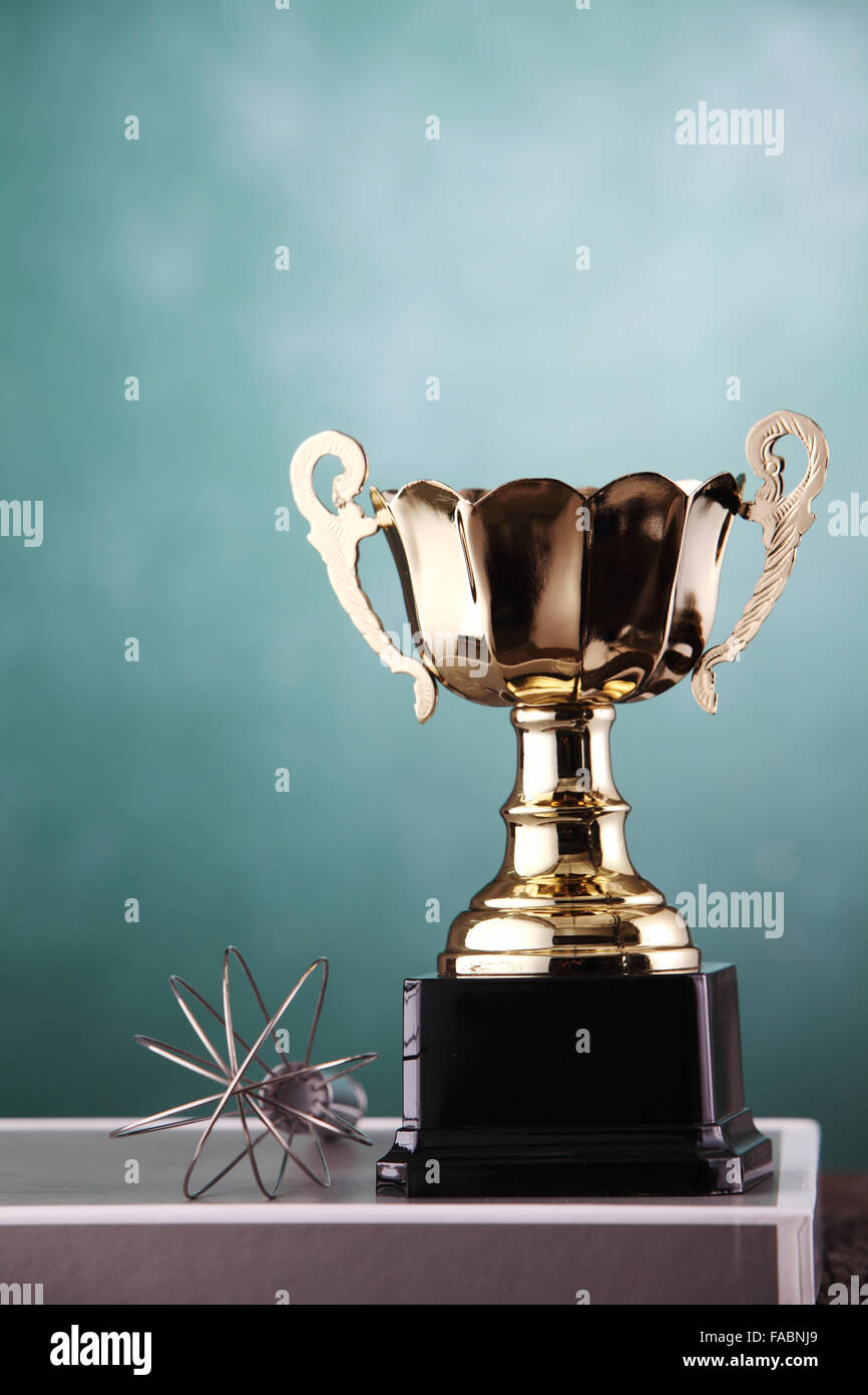 trophy and the wire whisk Stock Photo - Alamy