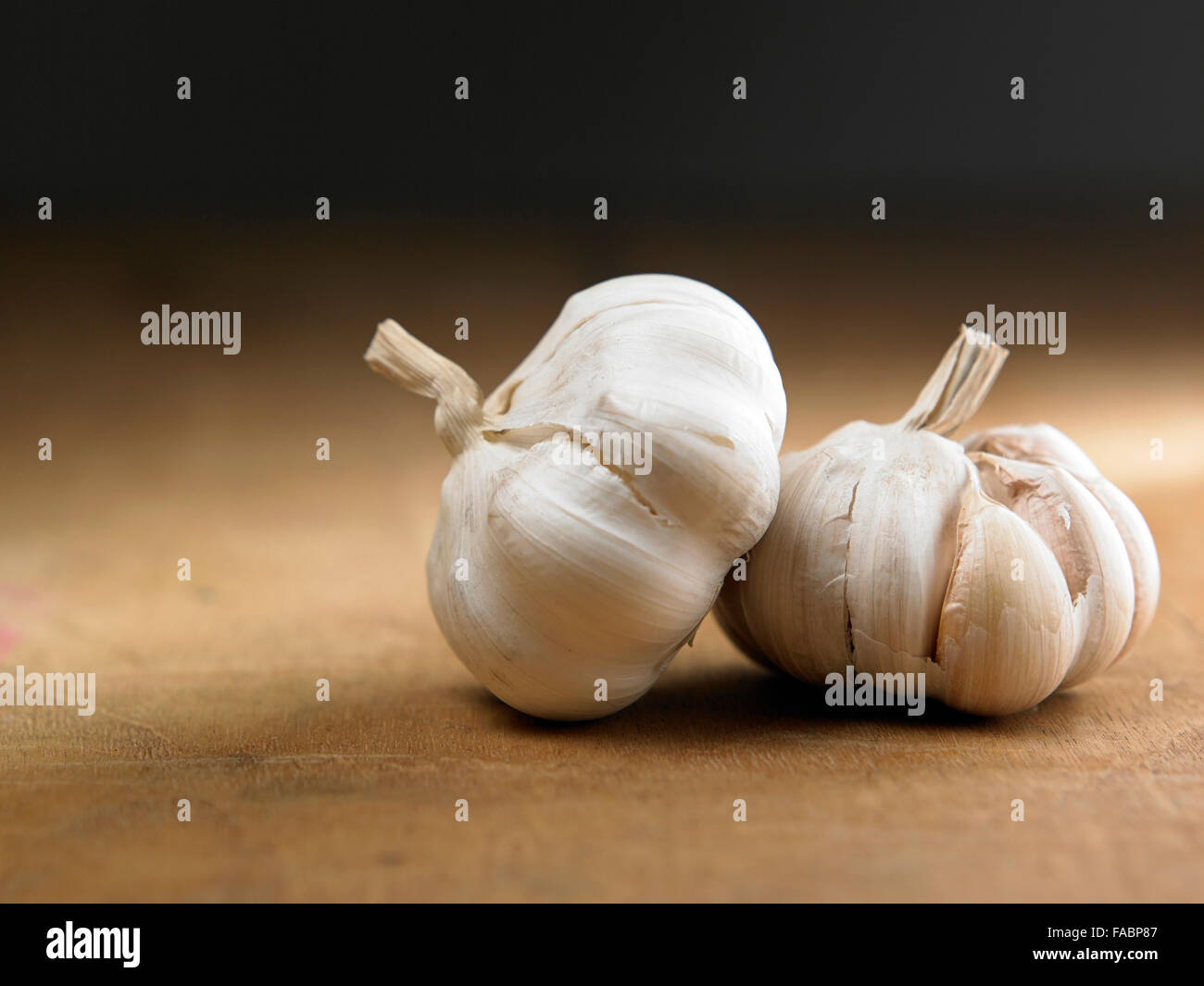 two garlic side by side Stock Photo - Alamy