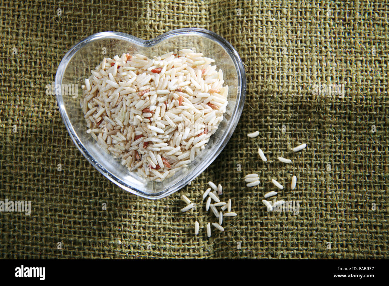 brown rice in the glass bowl Stock Photo - Alamy