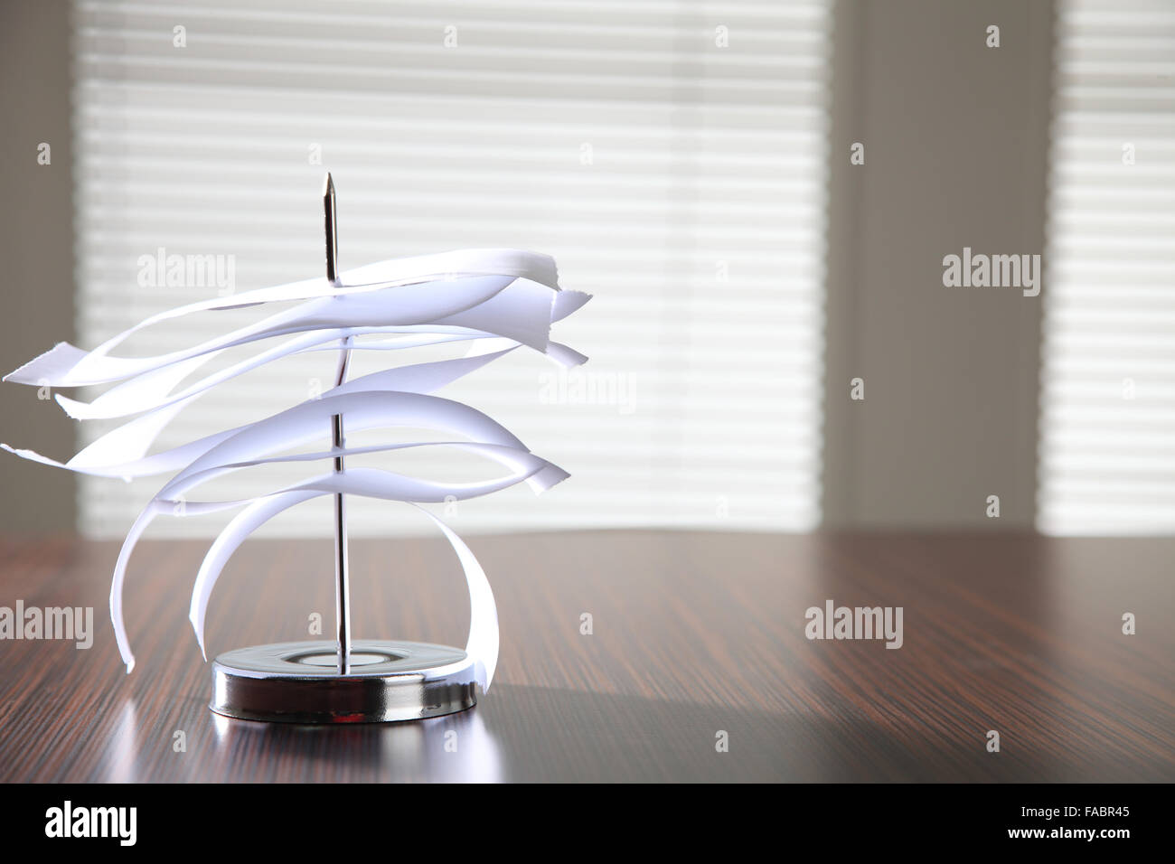 blank receipt on the paper spike Stock Photo - Alamy