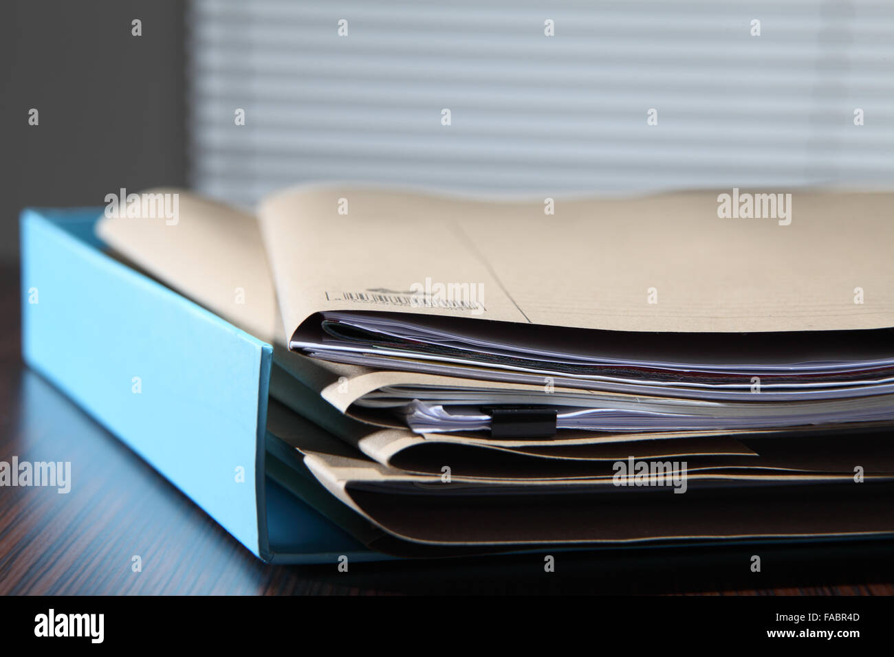 stacks of files waiting for solve Stock Photo - Alamy