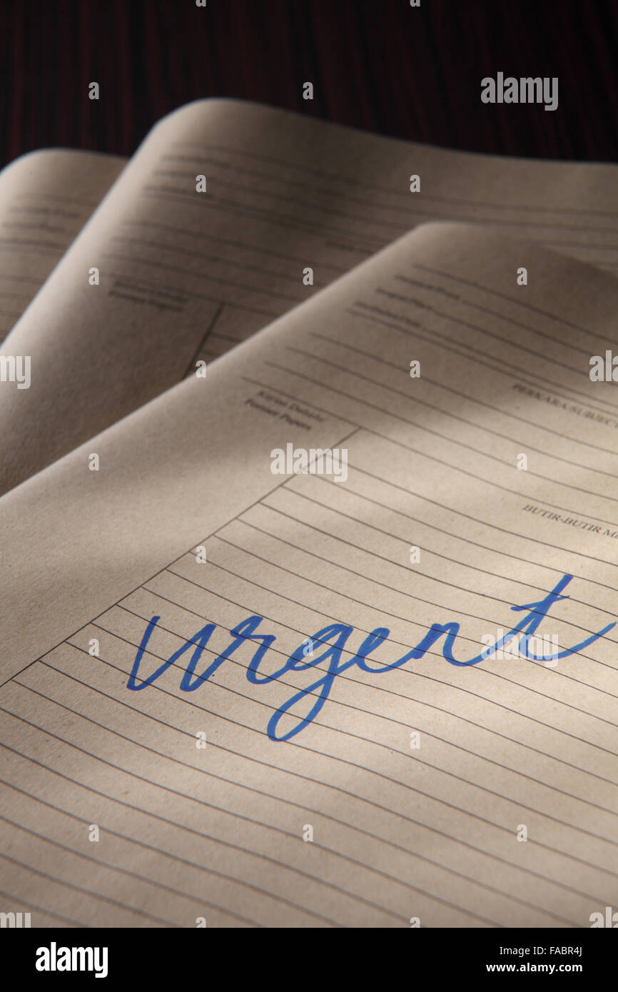 stacks of urgent brown paper files Stock Photo - Alamy