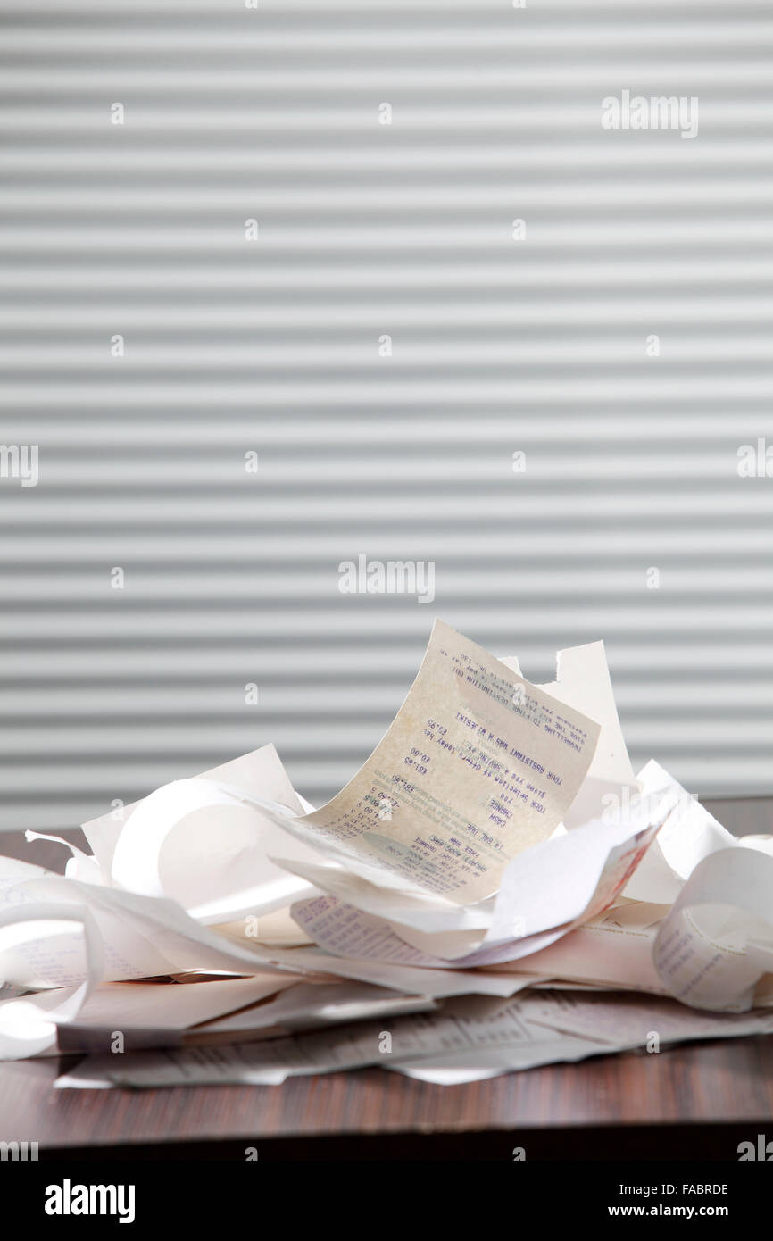 stack of the receipt on the table Stock Photo - Alamy