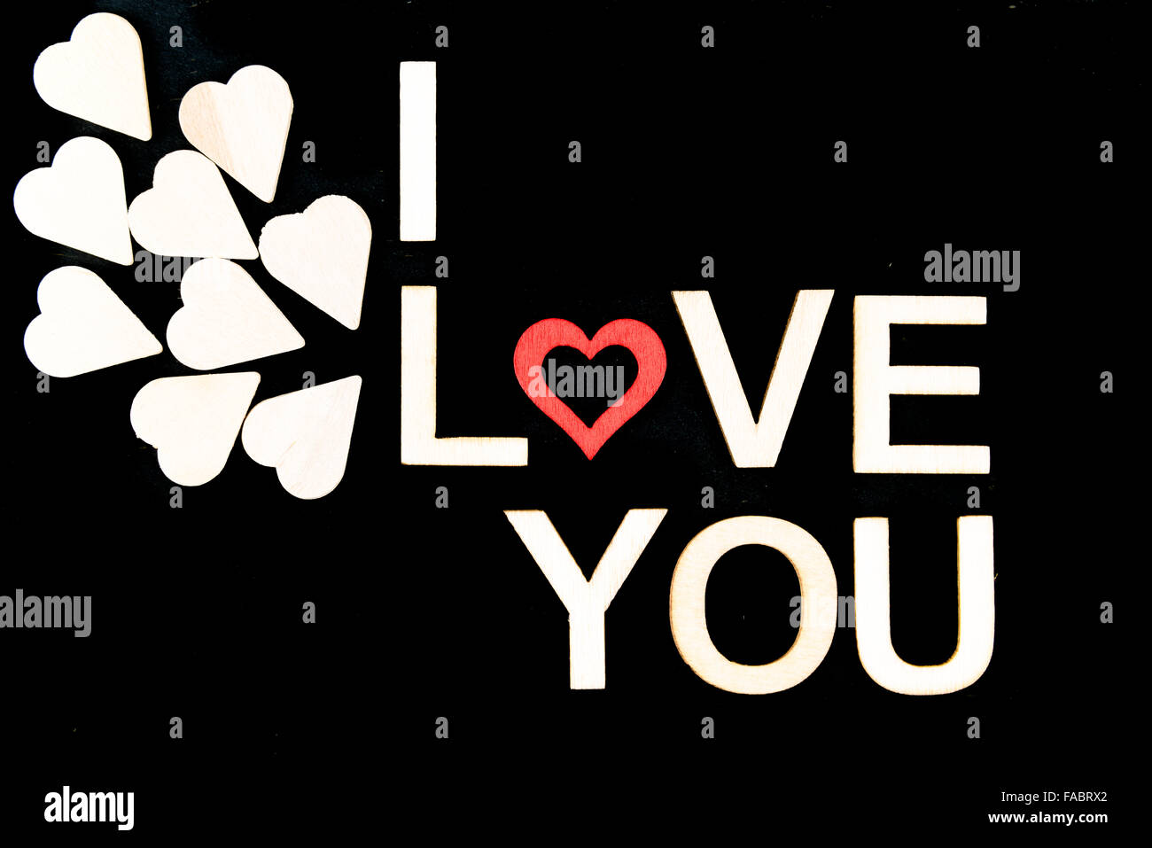 Words I LOVE YOU created of wood letters over vintage chalkboard, wood ...