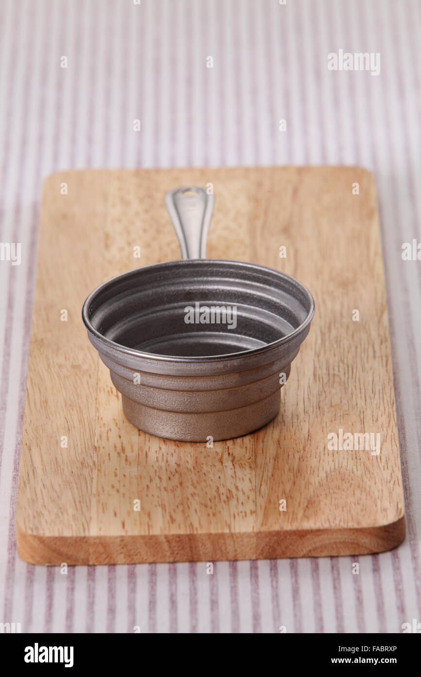 baking utensil on the chopping board Stock Photo - Alamy